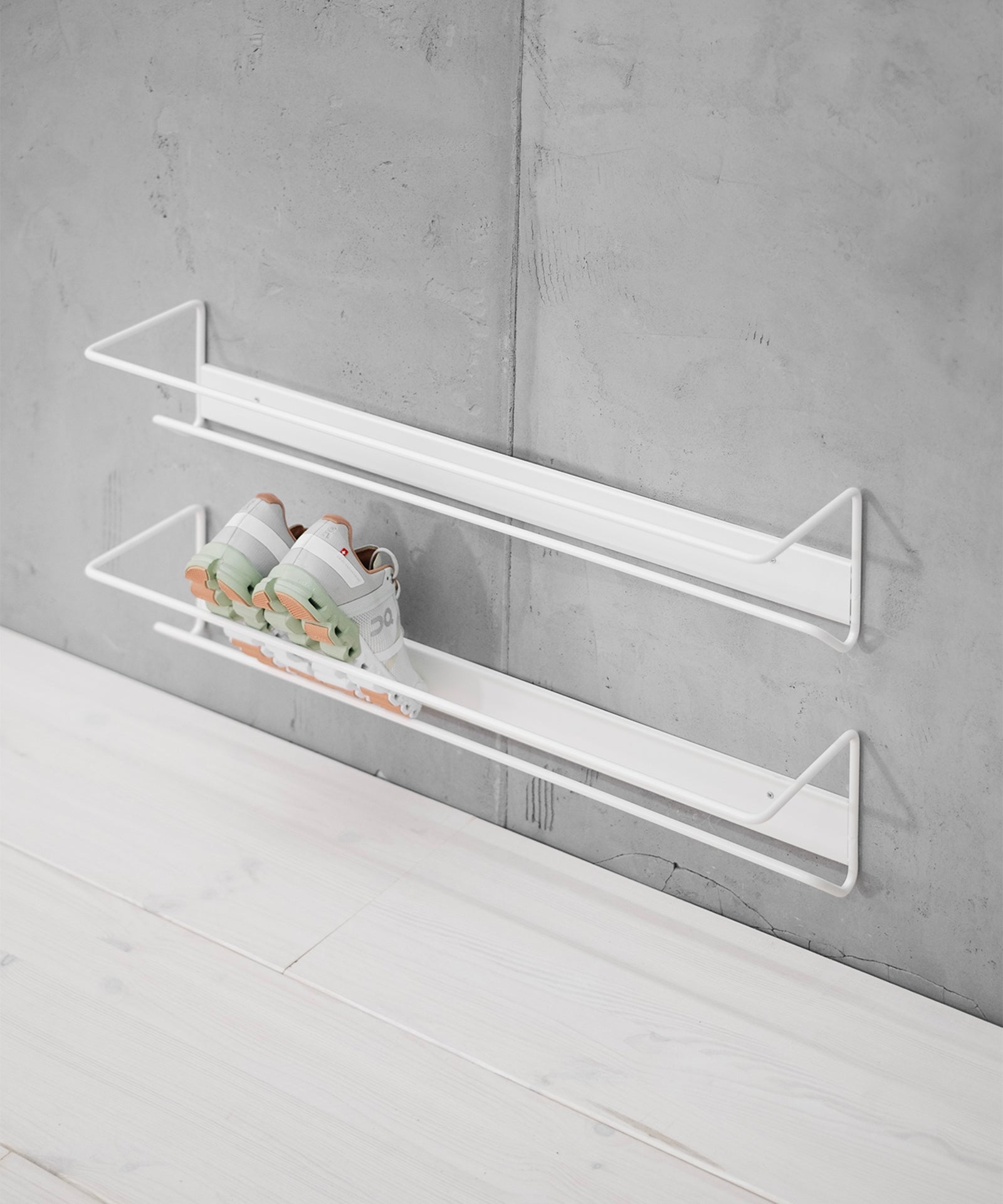 White metal shoe rack store